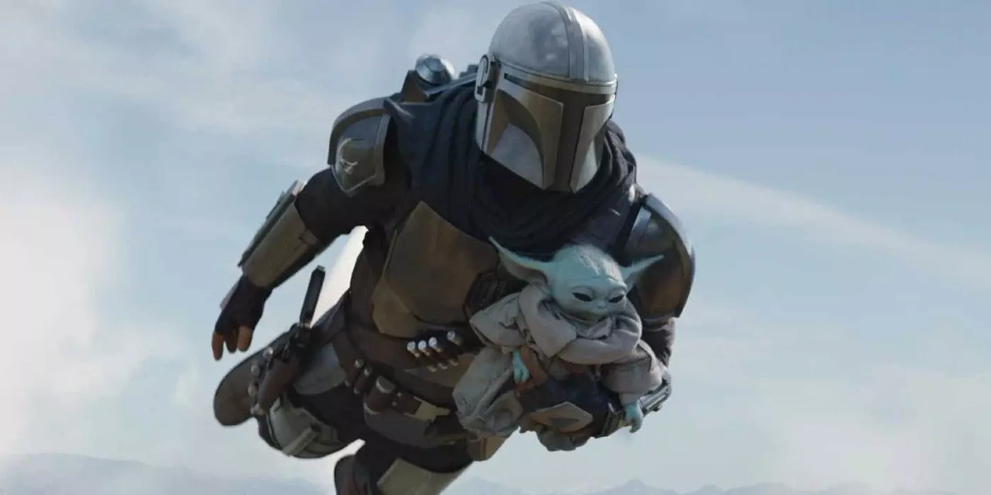 Din Djarin vum Mandalorian fléien mat engem Jetpack Baby Yoda / Grogu