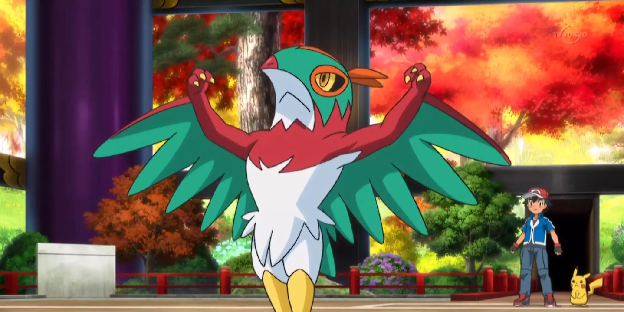 Ash's Hawlucha haciendo una pose mientras Ash y Pikachu miran en el anime