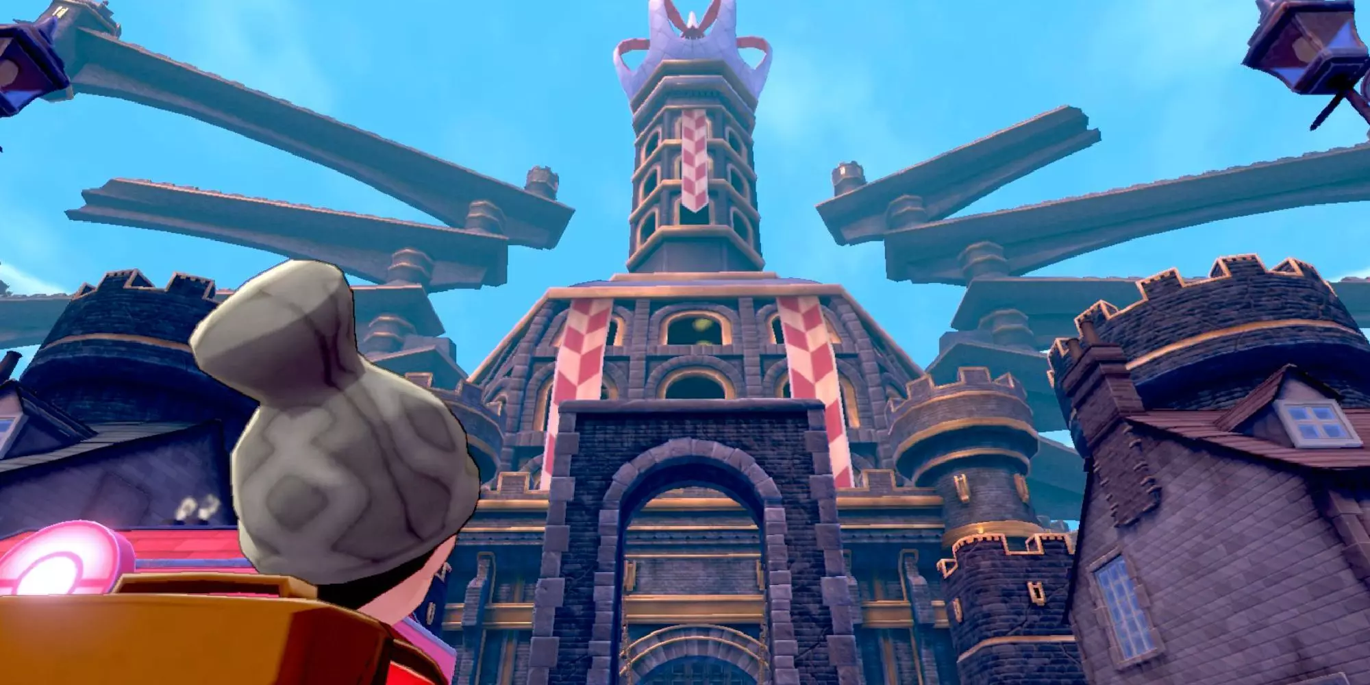 'n Speler wat opkyk na Hammerlocke-kasteel in Pokémon Sword & Shield