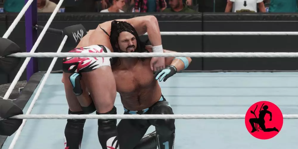 WWE-2K-Low-Blow-Payback AJ Styles lage klap voor Daniel Bryan