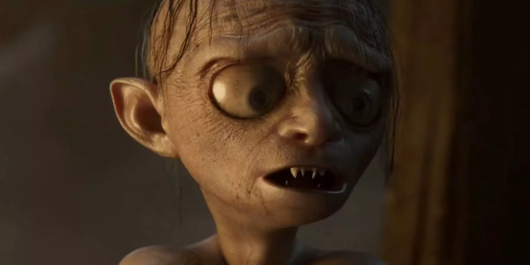 Close-up van Gollum die er nerveus uitziet in een trailer voor Lord of the Rings: Gollum