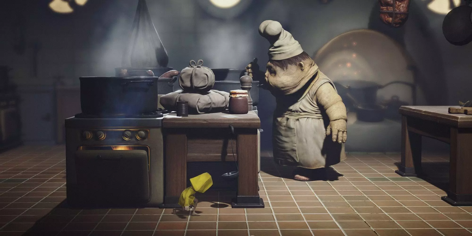 Šestka z Little Nightmares se plíží kolem groteskního kuchaře v kuchyni