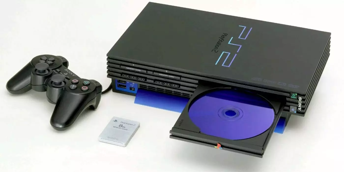 sawirka PS2 console oo leh kontaroole, kaadhka xusuusta, iyo disk furan