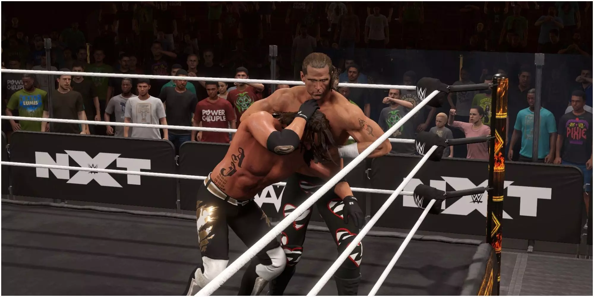 WWE 2K22 शॉन मायकेल AJ स्टाइल्सला दोरीवर ओढत आहे