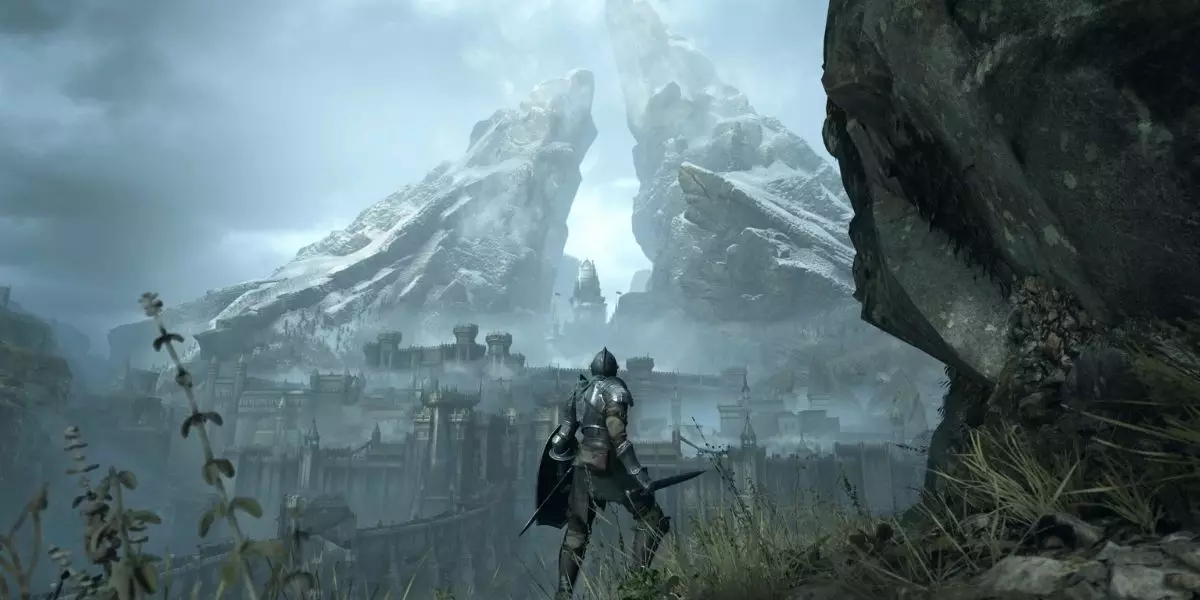 Jucătorul Demon's Souls stând în fața munților