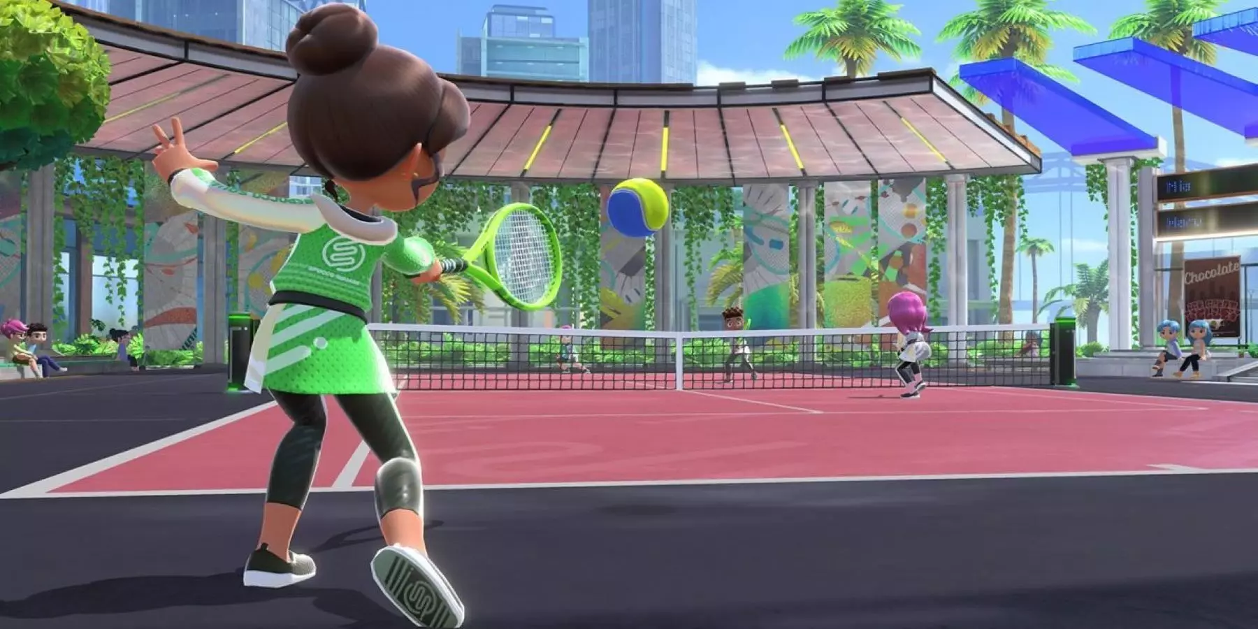 Športoví kolegovia hrajúci tenis v hre Nintendo Switch Sports