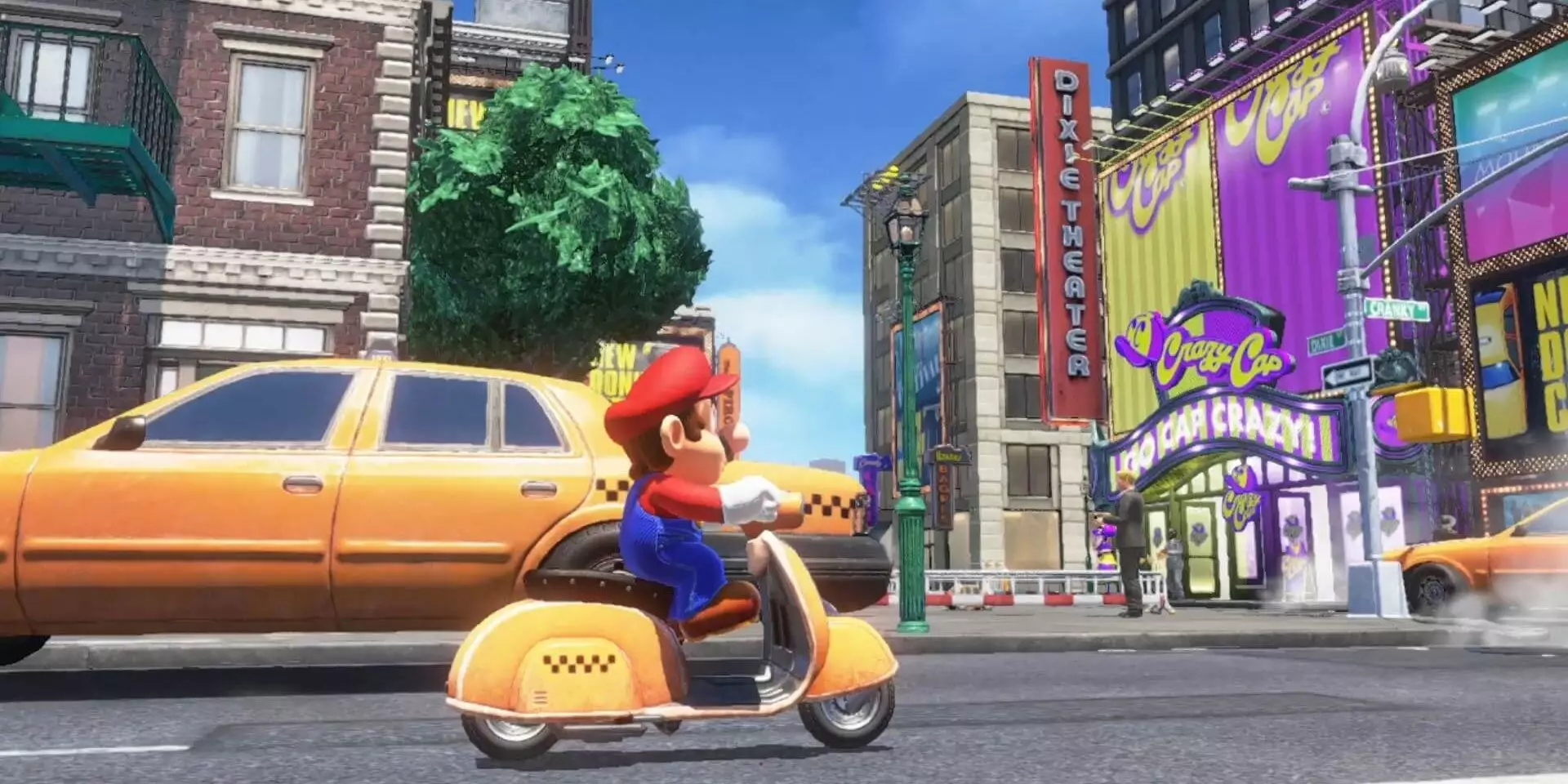 Mario in sella a un motorino nella New Donk City di Super Mario Odyssey