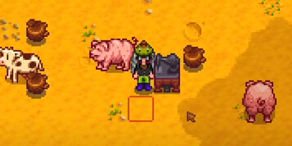 Personatge de Stardew Valley amb camisa de bandana fosca i barret de dinosaure al mig del camp