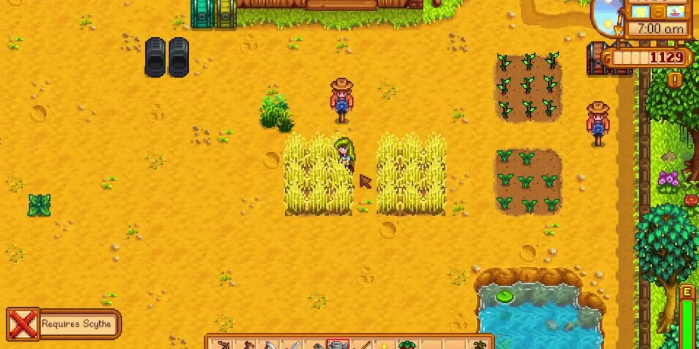 feirm cruithneachta ghleann stardew folamh os cionn locháin le préachán scanraithe